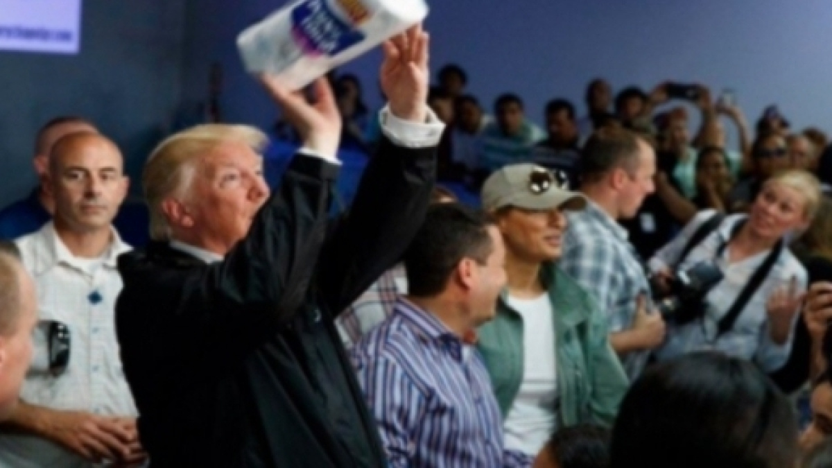 Donald Trump throws paper towels to desperate hurricane survivors in ...